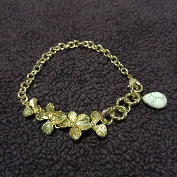Charming Charlie | Jewelry | Charming Charlie Gold Tone Floral Bracelet ...